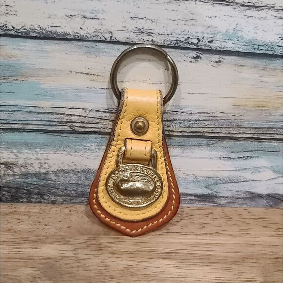 Dooney & Bourke | Accessories | Vintagedooney Bourke Palomino Yellow ...